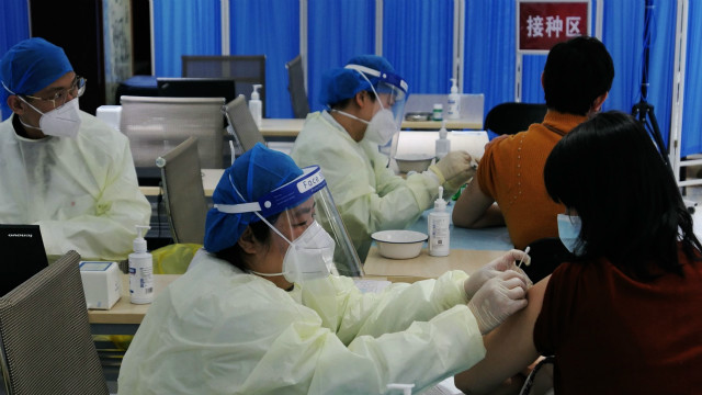 CDC: China to vaccinate 70 to 80 percent of its population by mid-2022 ...
